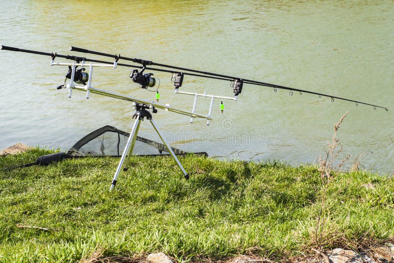 The Fishing Rod is Set on the River Bank. Good Luck for Fishing. Stock ...