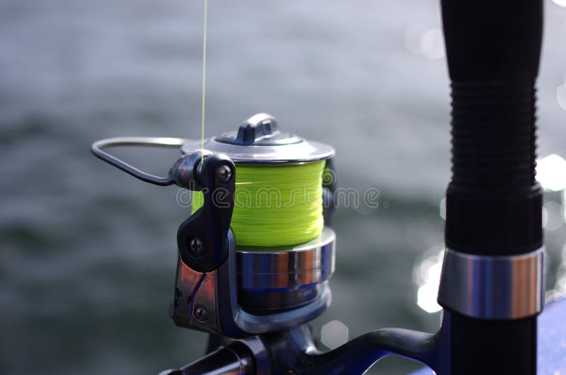 Fishing Rods with Spinning Reels Editorial Stock Image - Image of blue ...