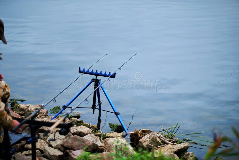 Fishing Rod on a Stand on the River Bank while Fishing Stock Image ...