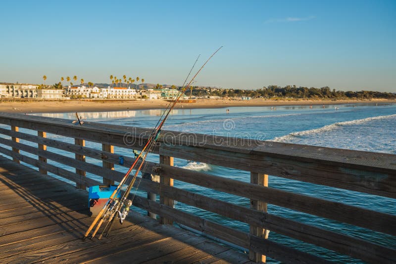 Fishing Rods on the Pier at Sunset Stock Image - Image of fishing ...
