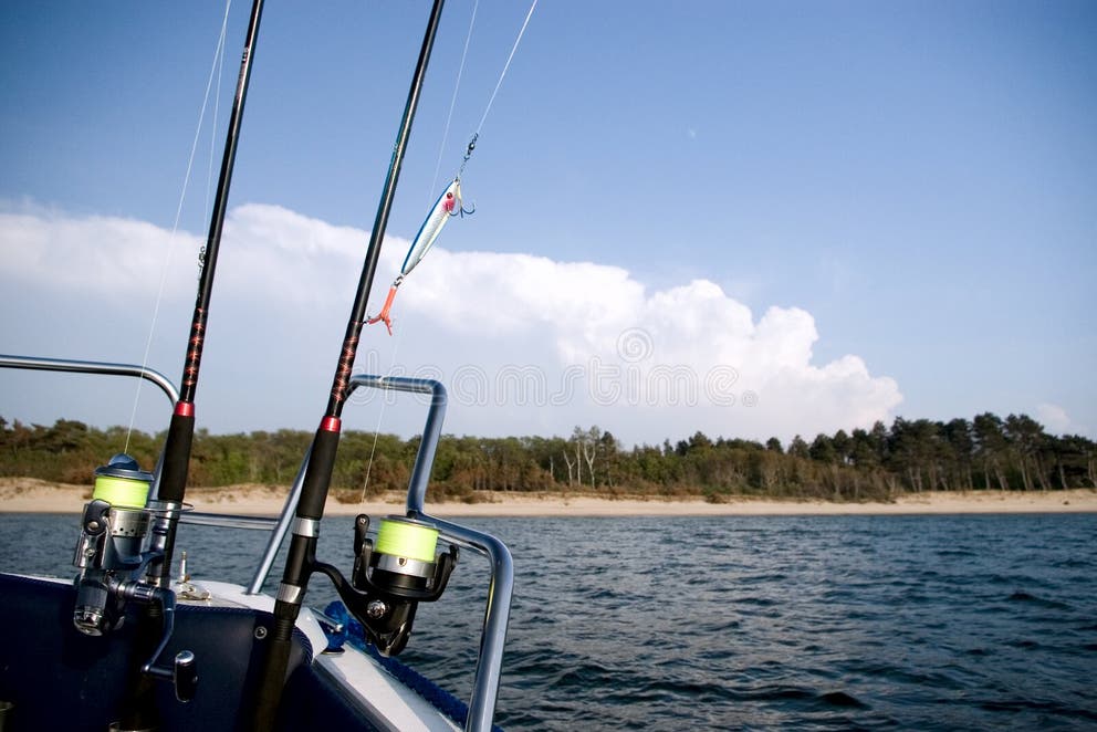Fishing rods at sea. stock image. Image of beach, reels - 2494627