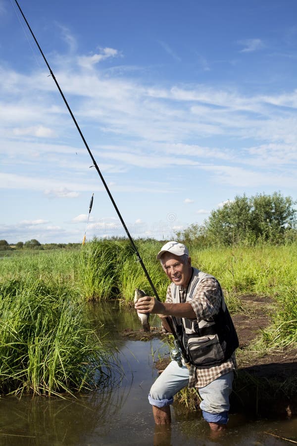 Fishing scene stock photo. Image of retiremant, reflection - 21064308