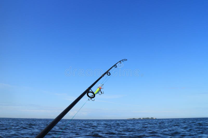 Fishing on the sea stock image. Image of fish, stretching - 154433659