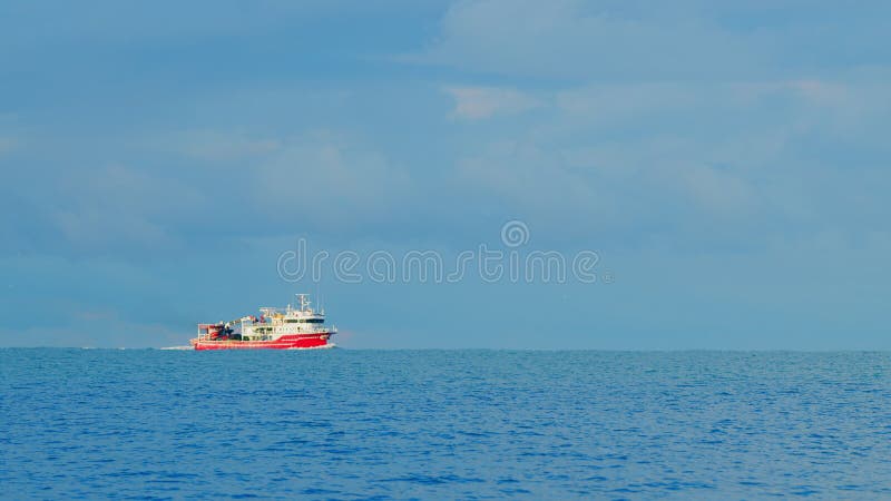 Fishing Ship Fishing in Clear Blue Water in the Middle of the Ocean ...
