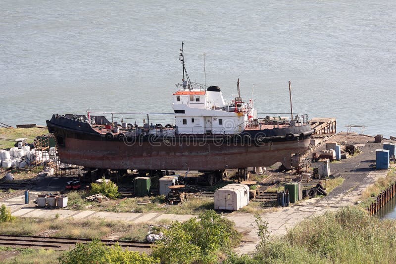 Fishing Ship during Repair Work on the Shore Stock Photo - Image of ...