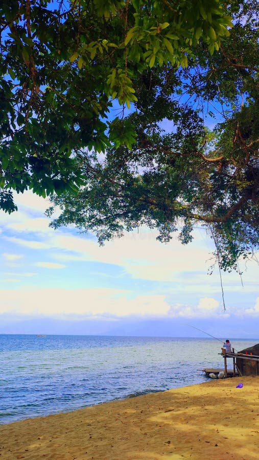 Fishing on the Shores of Lake Poso Editorial Photo - Image of fishing ...