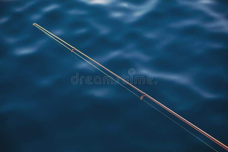 Fishing Stick and Water stock photo. Image of background - 101408736