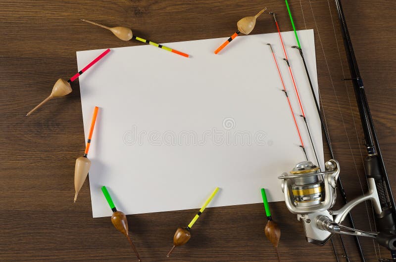 Fishing Tackle with the Blank Sheet of Paper Stock Photo - Image of ...