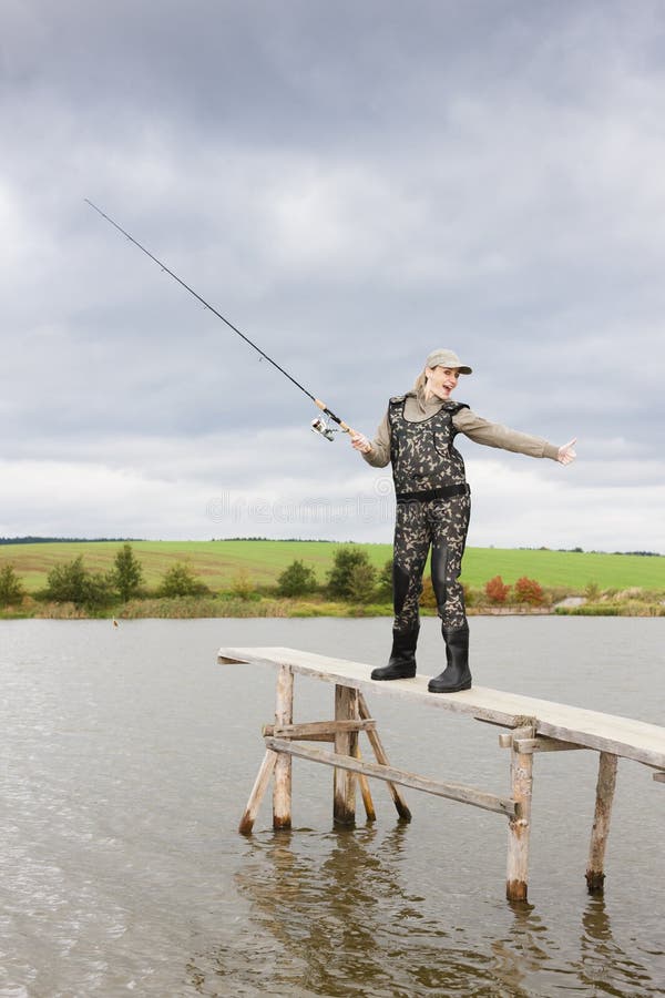 Fishing woman stock image. Image of autumn, pond, people - 36636625