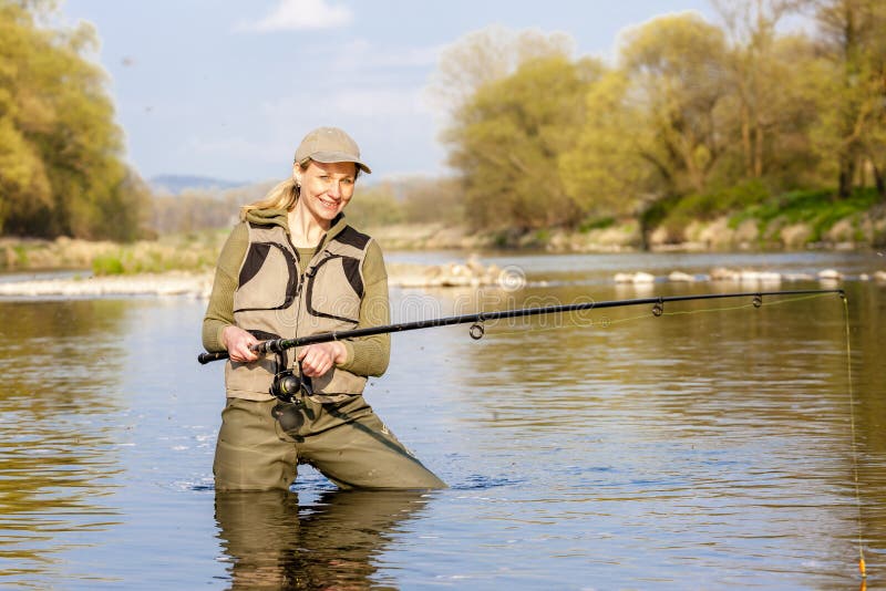 Fishing woman stock image. Image of adult, relaxing, hobby - 62407385