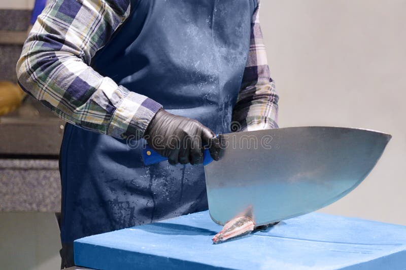 Fishmonger cutting fish stock image. Image of fishmonger - 376141199