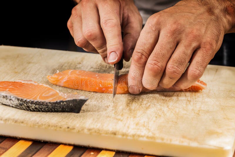 Fishmonger Prepare a Salmon Fillet Stock Image - Image of fish, fillet ...