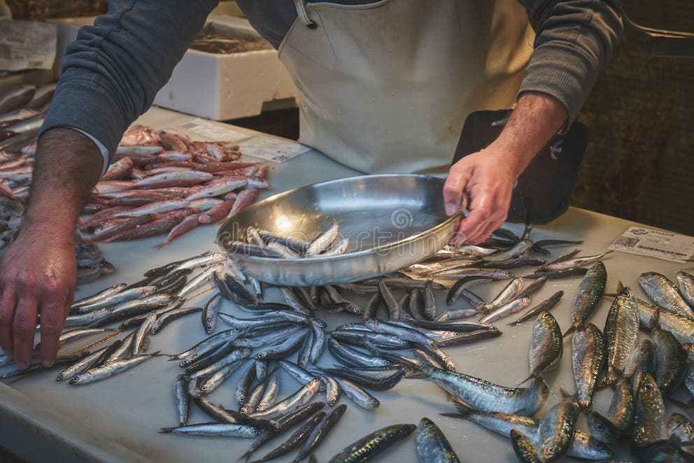 Fishmonger with flounder stock photo. Image of ocean - 169708844