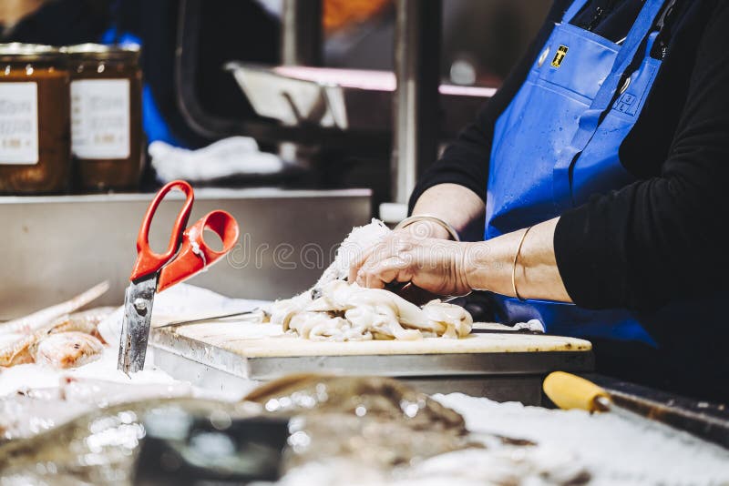 Fishmonger S Hands Gutting and Slicing Fresh Fish Stock Image - Image ...