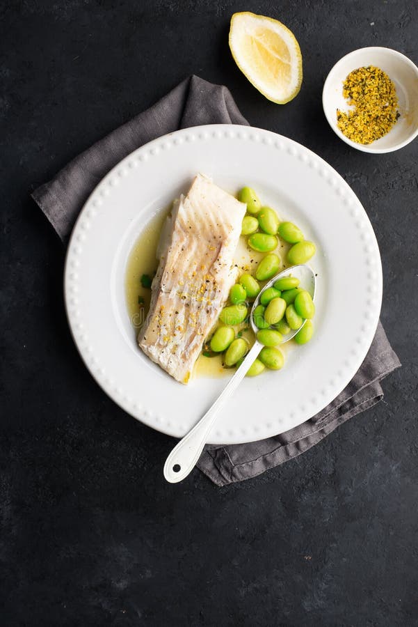 Fishplate. Sea White Cod Fish with a Side Dish of Vegetables and ...