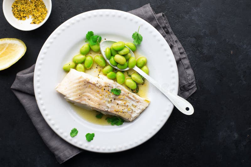 Fishplate. Sea White Cod Fish with a Side Dish of Vegetables and ...