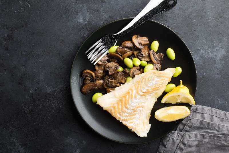 Fishplate. Sea White Cod Fish with a Side Dish of Vegetables and ...