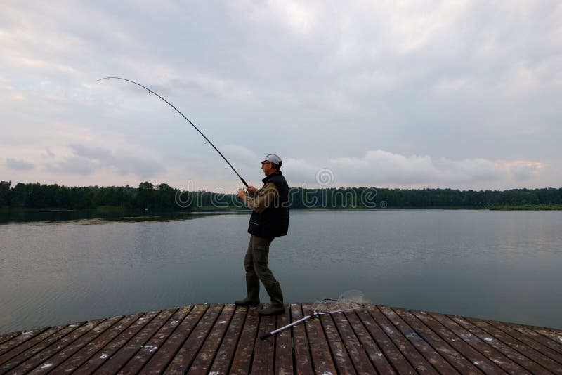 Fiskare fotografering för bildbyråer. Bild av reflexioner - 118538113