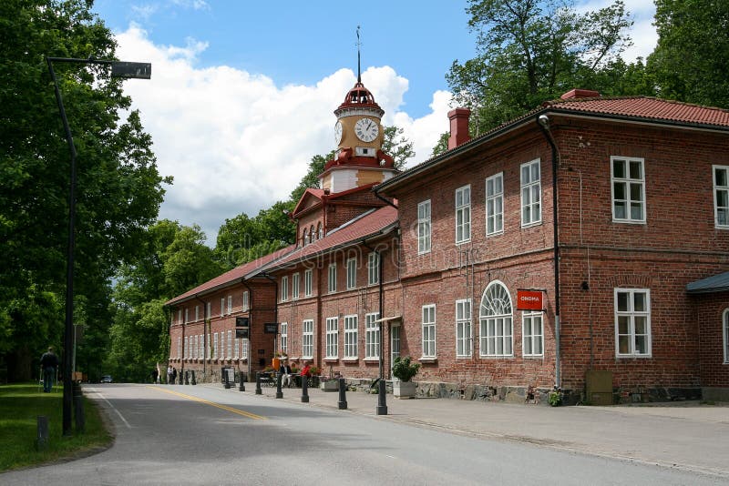 Old Brick Building with a Tower Clock Editorial Photo - Image of ...