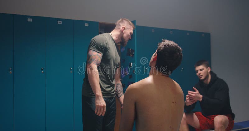 Fist Fighting in Locker Room Stock Footage - Video of sportsmen ...