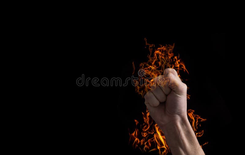 Fist with fire and sparks. stock photo. Image of fire - 265443916