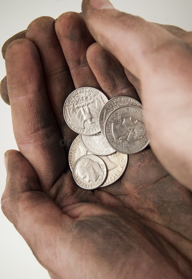 Fistful of Dollar coins stock image. Image of finance - 37264623