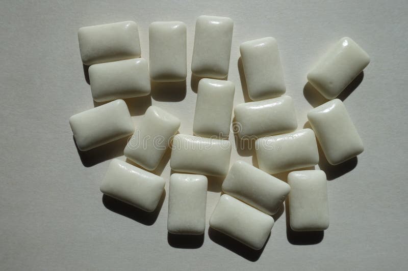 Fistful of White Pieces of Chewing Gum from Above Stock Photo - Image ...