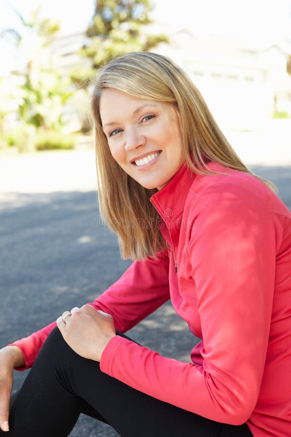 Fit, active woman outdoors stock image. Image of resting - 54949771