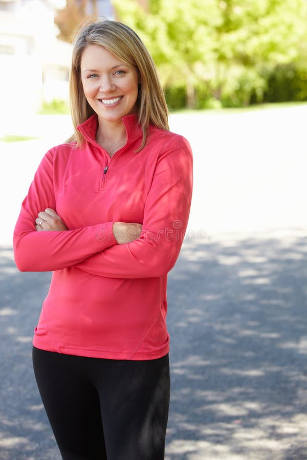 Fit, active woman outdoors stock image. Image of health - 55892129