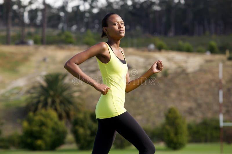 Fit African Woman Running Outdoors Stock Photo - Image of female, away ...