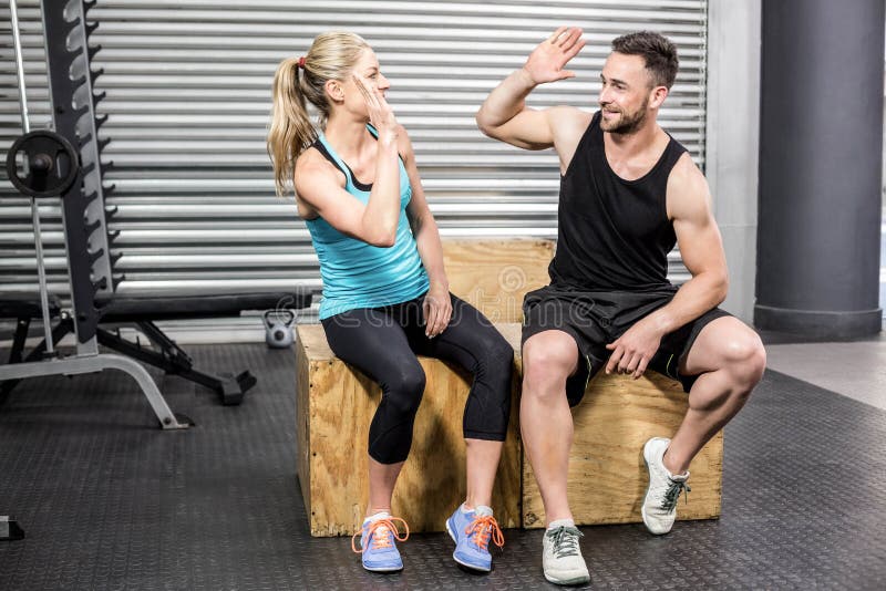 Fit couple doing high five stock image. Image of athlete - 66174989