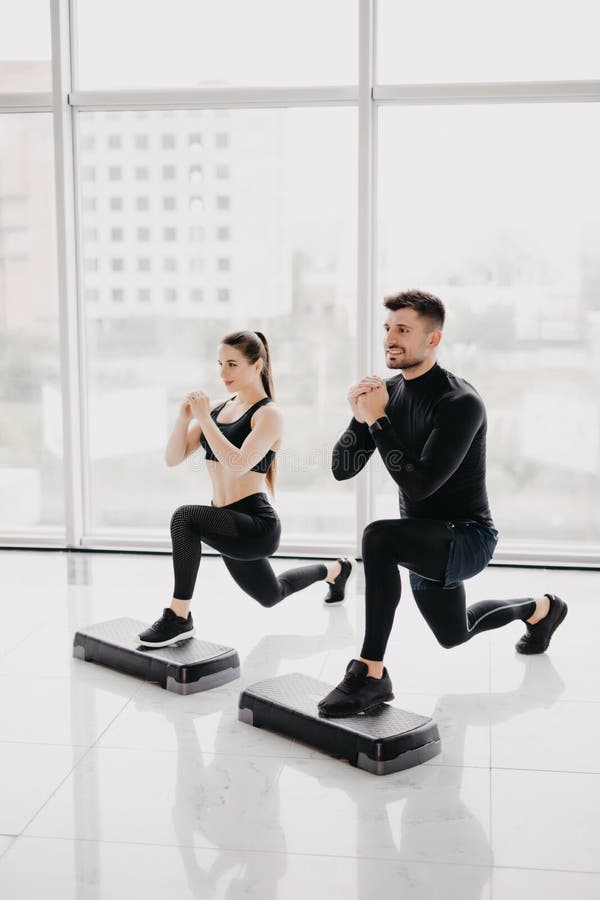 Fit Couple Working Out Make Squats Together at Gym Stock Image - Image ...