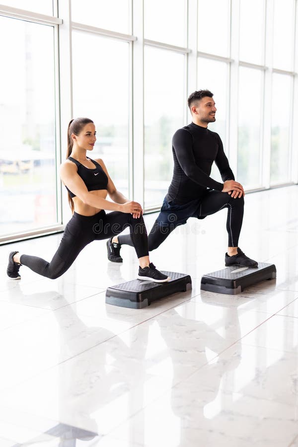 Fit Couple Working Out Make Squats Together at Gym Stock Image - Image ...