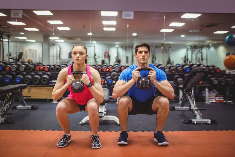Fit Couple Working Out in Weights Room Stock Photo - Image of ...