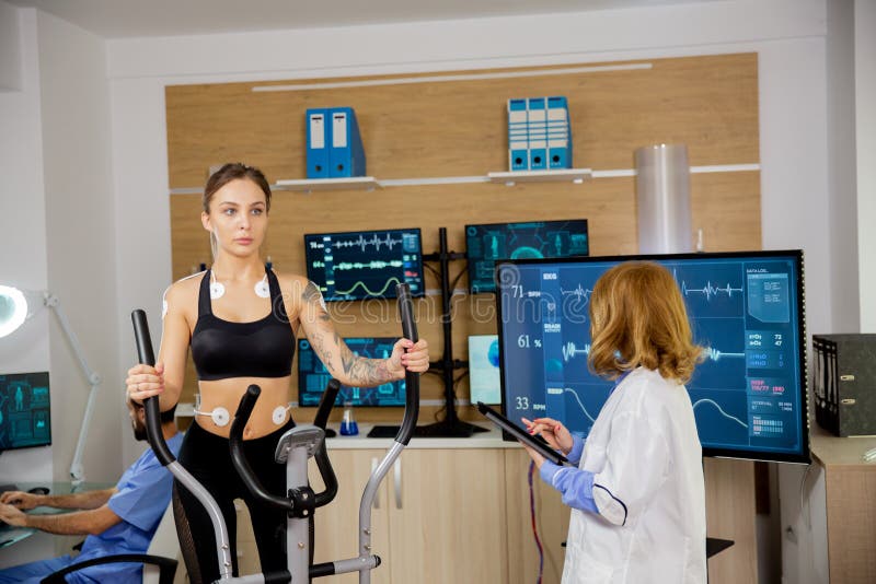 Fit Female Doing Endurance Test in the Lab Stock Photo - Image of ...