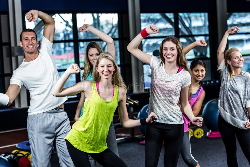 Fit Group Dancing and Smiling Stock Image - Image of attractive, adult ...