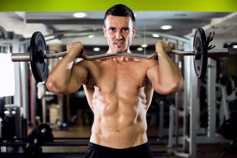 Fit Male Doing Biceps Exercise Stock Photo - Image of muscles, male ...