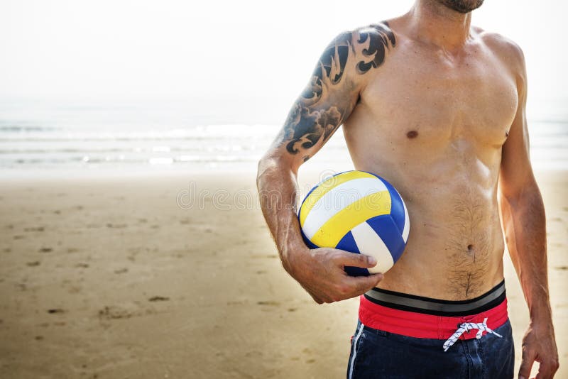 Fit Man Beach Ball Concept stock image. Image of relax - 80319081