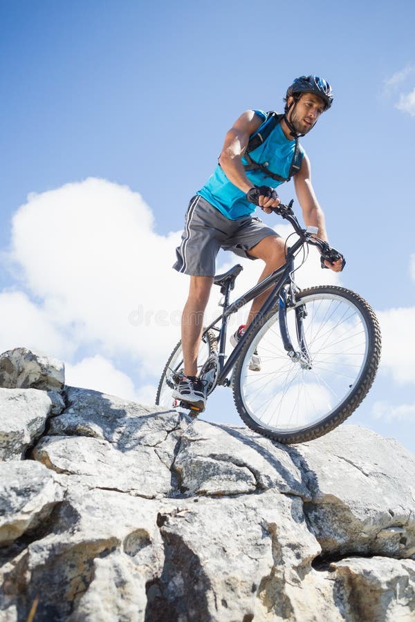 Fit Man Cycling on Rocky Terrain Stock Image - Image of healthy ...