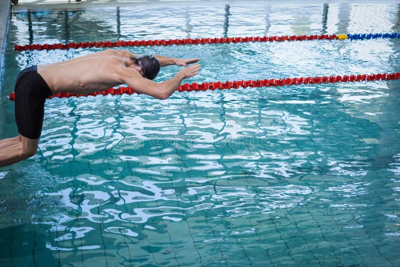 Fit Man Diving in the Water Stock Image - Image of person, movement ...