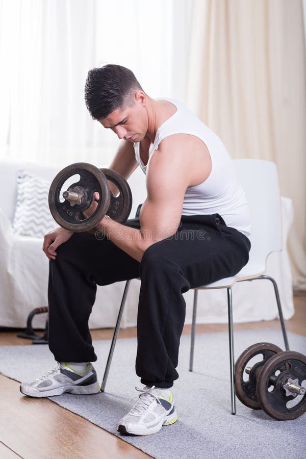 Fit man during exercise stock photo. Image of shape, muscular - 76812280