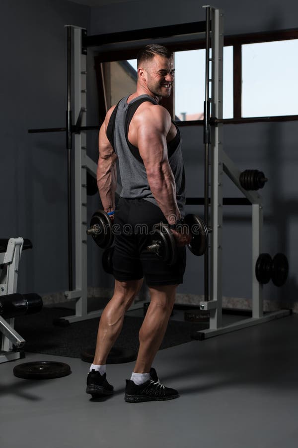 Fit Man Holding Weights in Hand Stock Image - Image of attractive, male ...