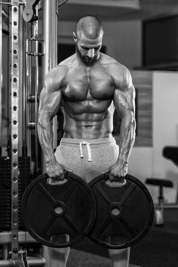 Fit Man Holding Weights in Hand Stock Image - Image of flexing ...