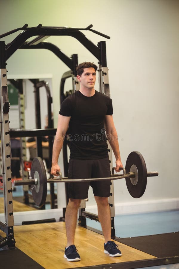 Fit Man Lifting Heavy Barbell Stock Photo - Image of attractive, health ...