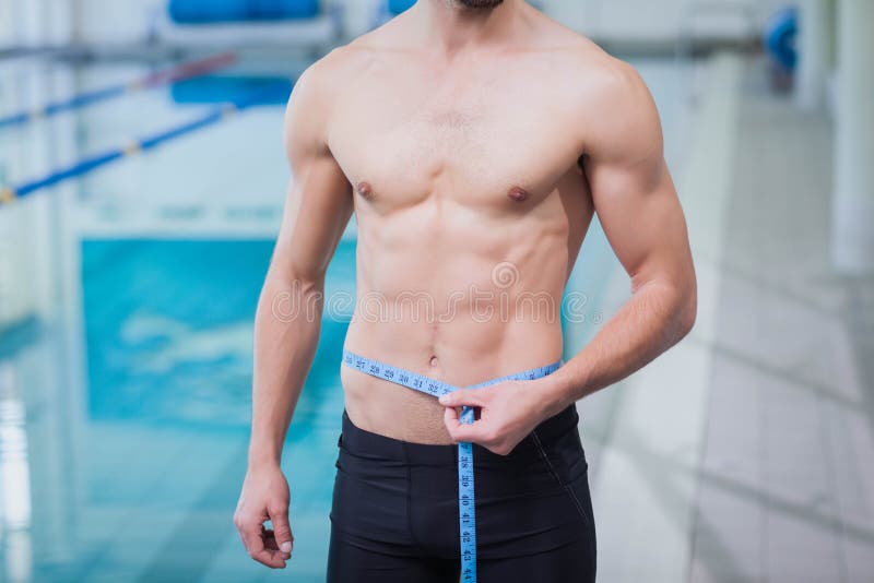 Fit Man Measuring His Waist Stock Photo - Image of smiling, body: 66173530