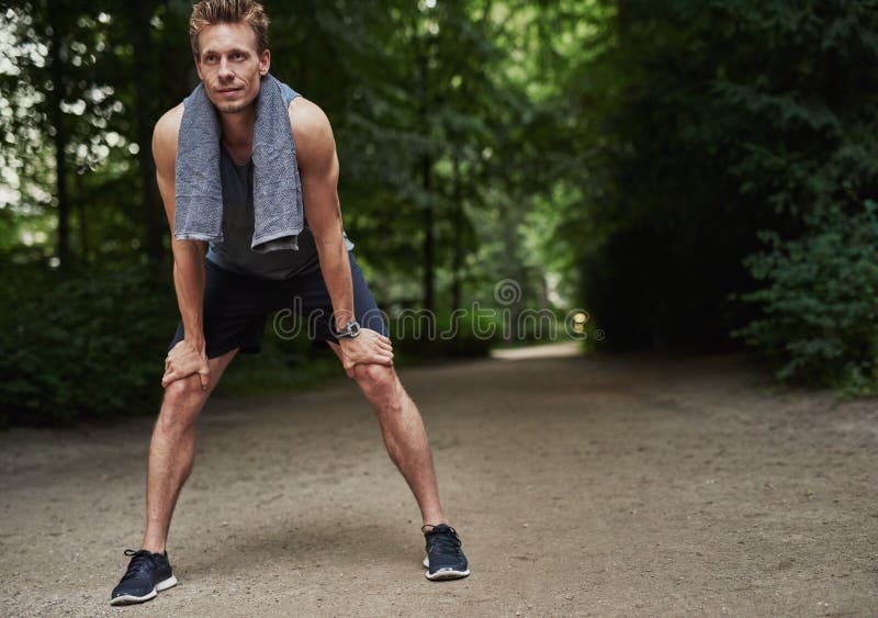 Fit Man Resting after Running at the Park Stock Image - Image of forest ...