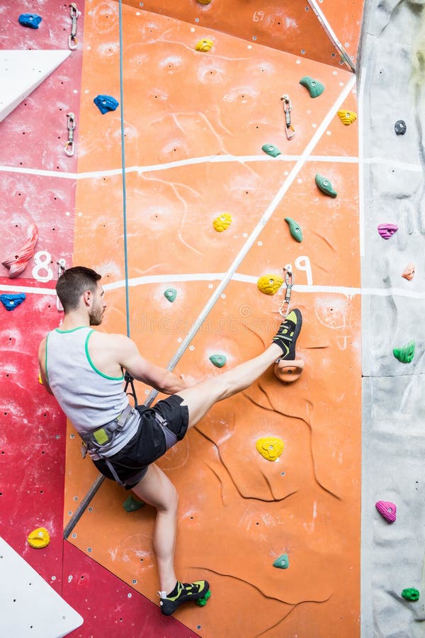 Fit Man Rock Climbing Indoors Stock Photo - Image of leisure, sporty ...
