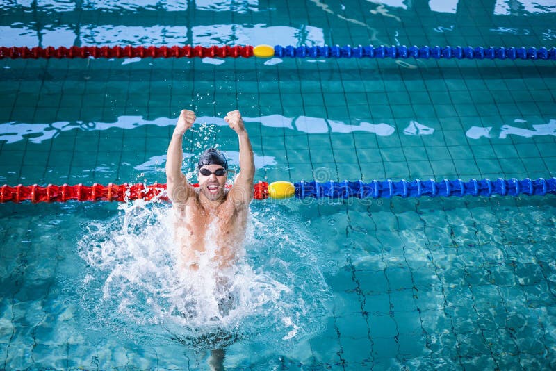 Fit man triumphing stock photo. Image of marker, goggles - 66173334