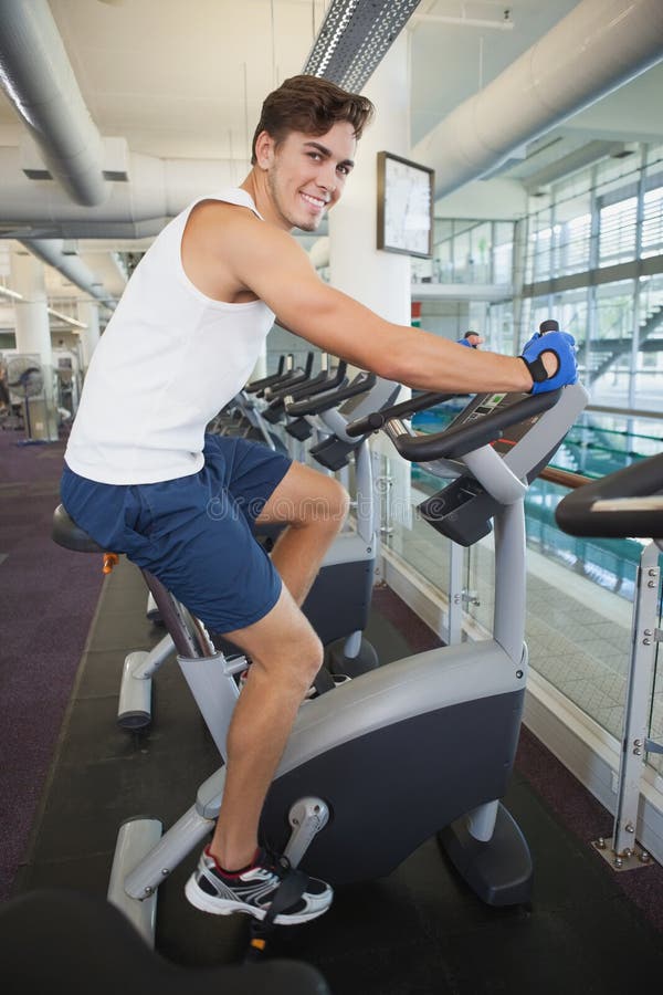Fit Man Working Out on the Exercise Bike Stock Image - Image of sports ...
