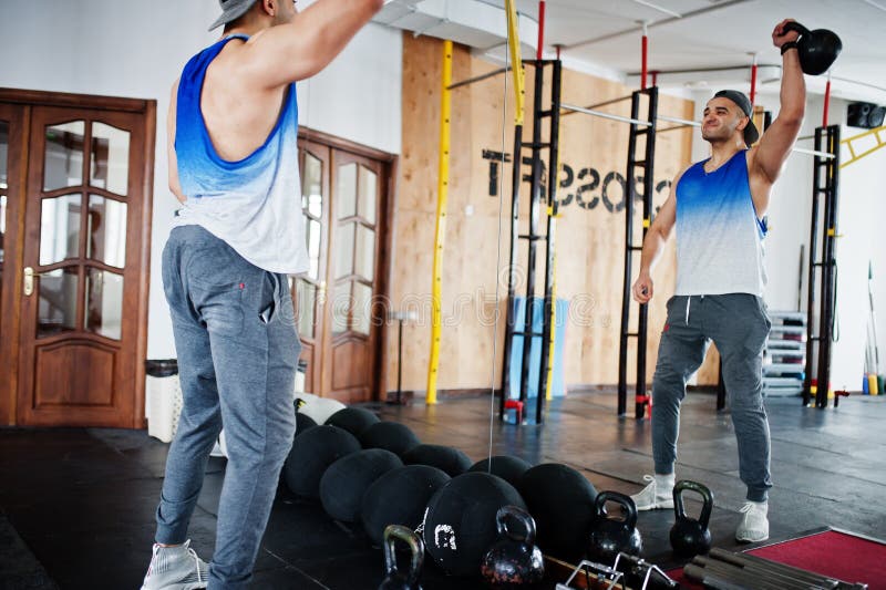 Fit and Muscular Arabian Man Doing Workouts in Gym Stock Photo - Image ...